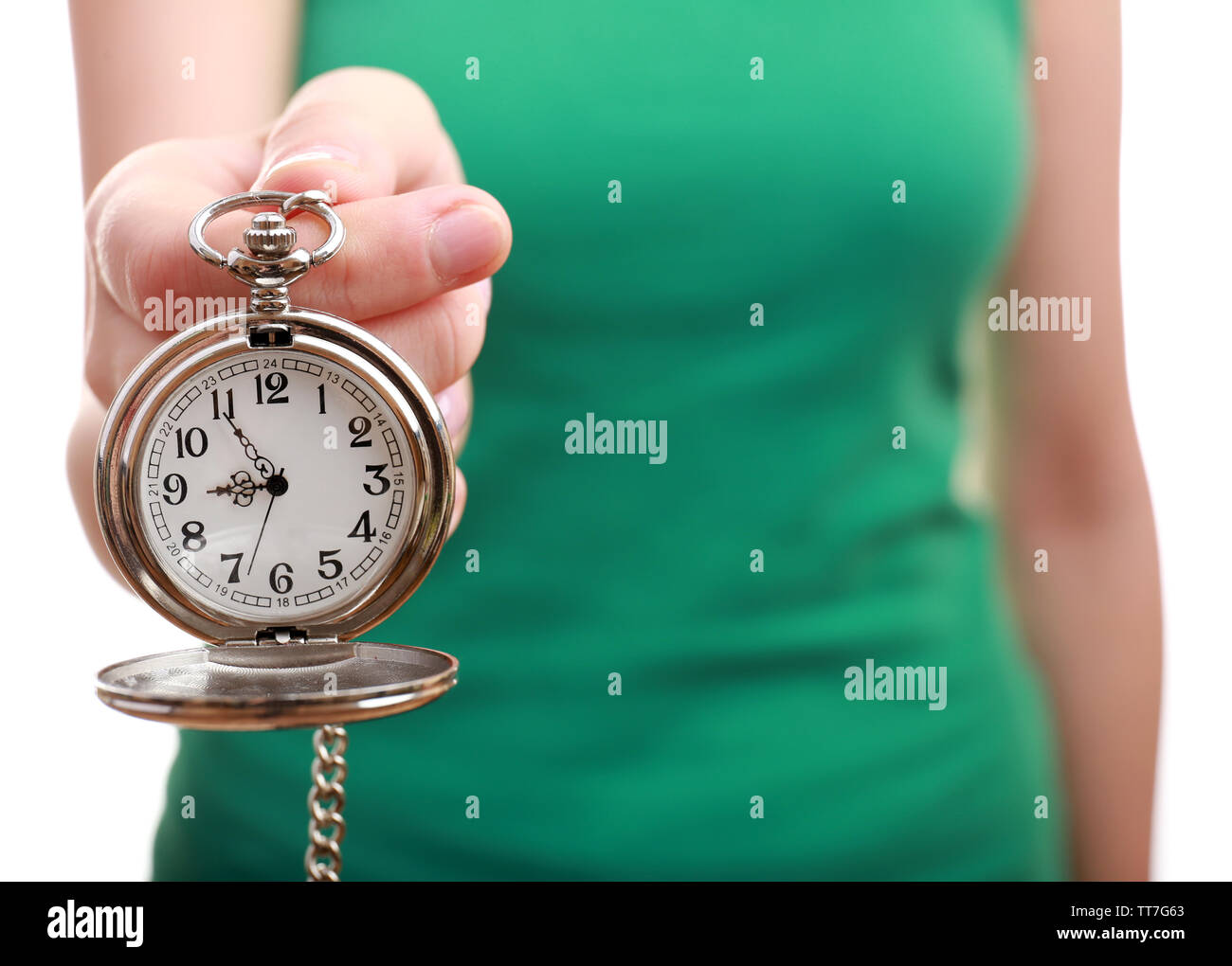 Silver pocket clock in hand close-up Stock Photo - Alamy