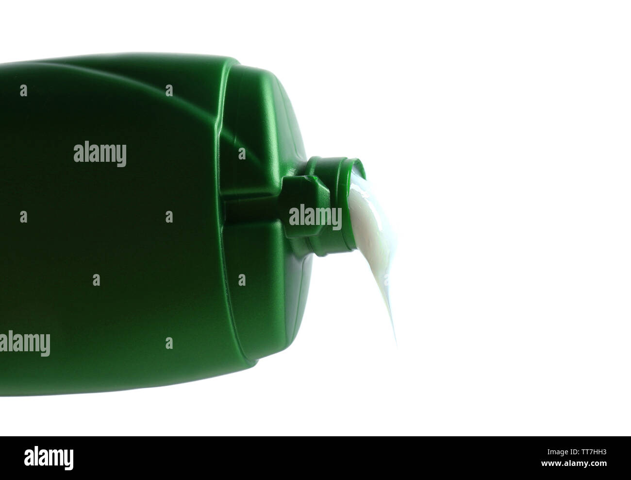 Cosmetic liquid pouring from bottle isolated on white Stock Photo - Alamy