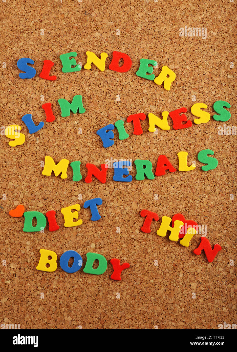 Different words on cork board background Stock Photo - Alamy