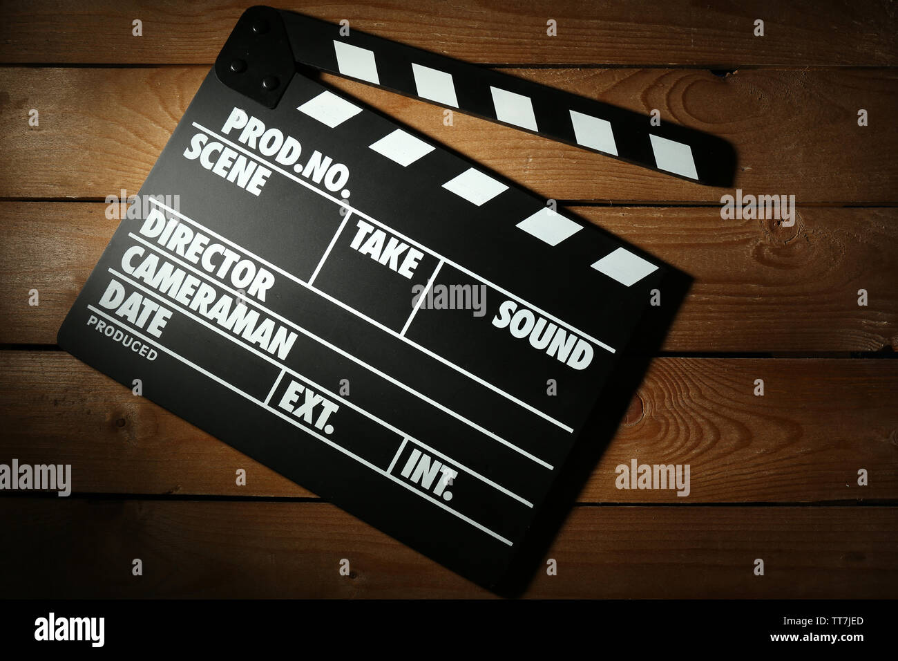 Movie clapper on wooden background Stock Photo - Alamy
