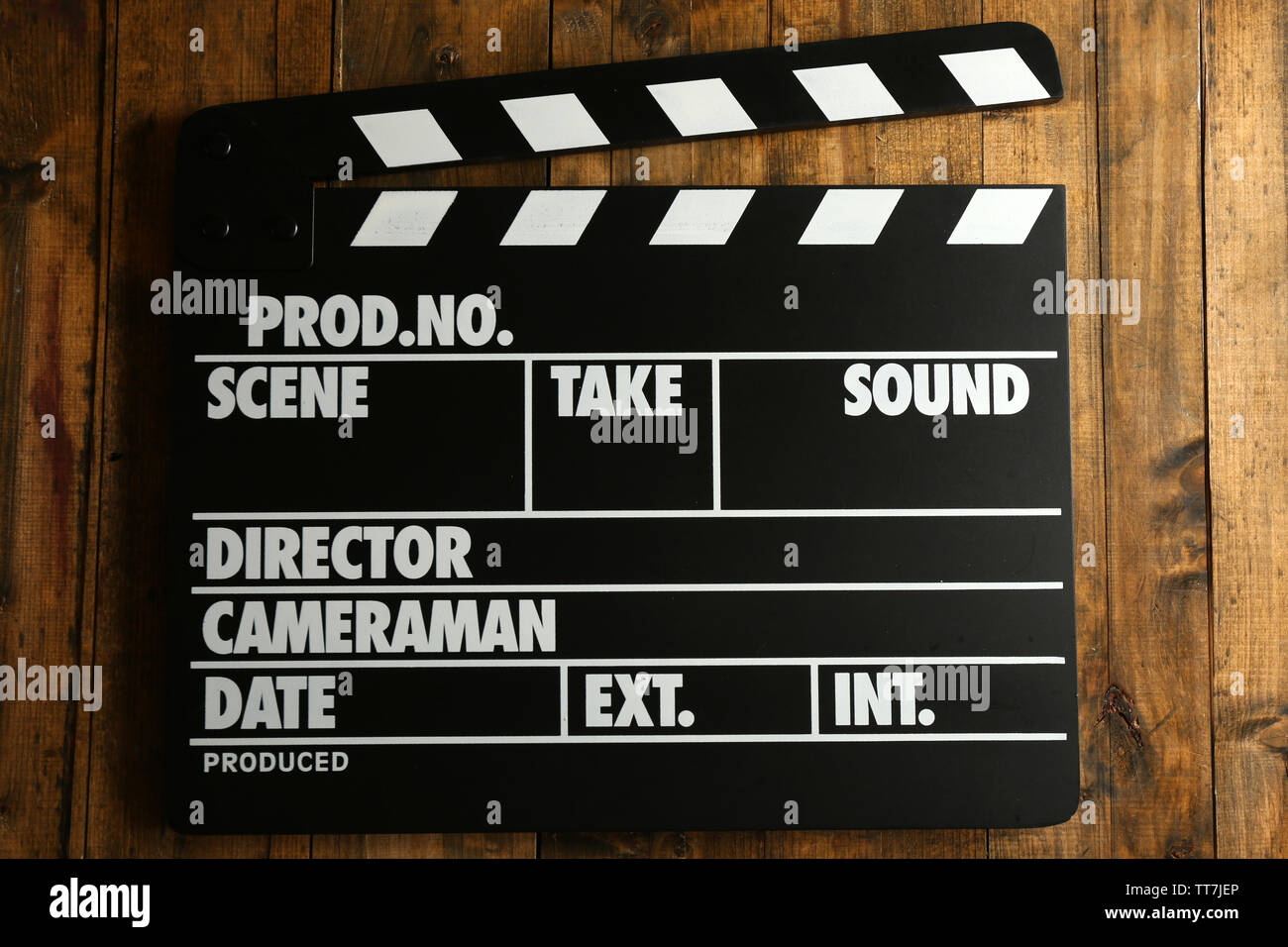 Movie clapper on wooden background Stock Photo - Alamy