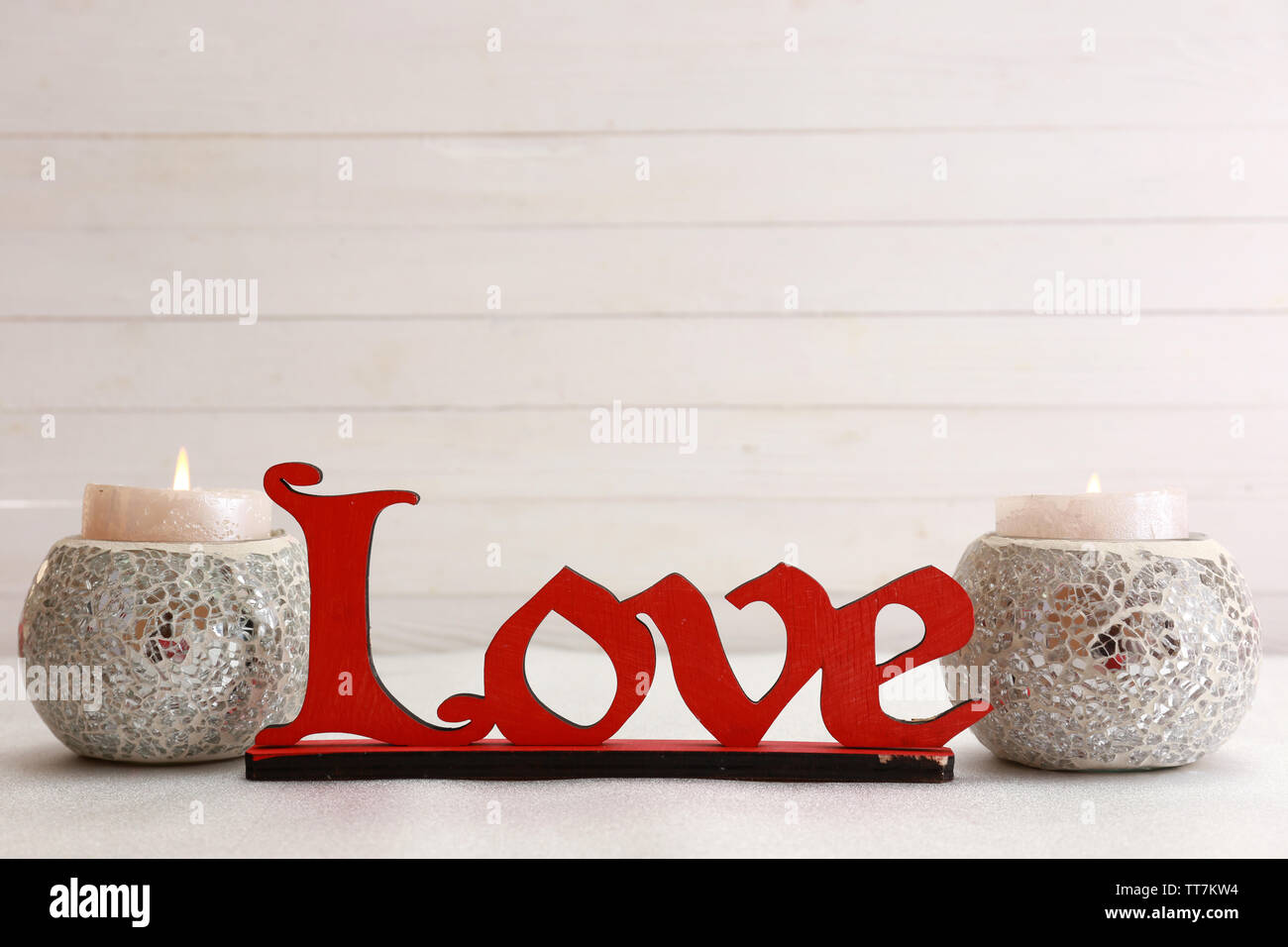 Romantic gift with candles, love concept Stock Photo - Alamy