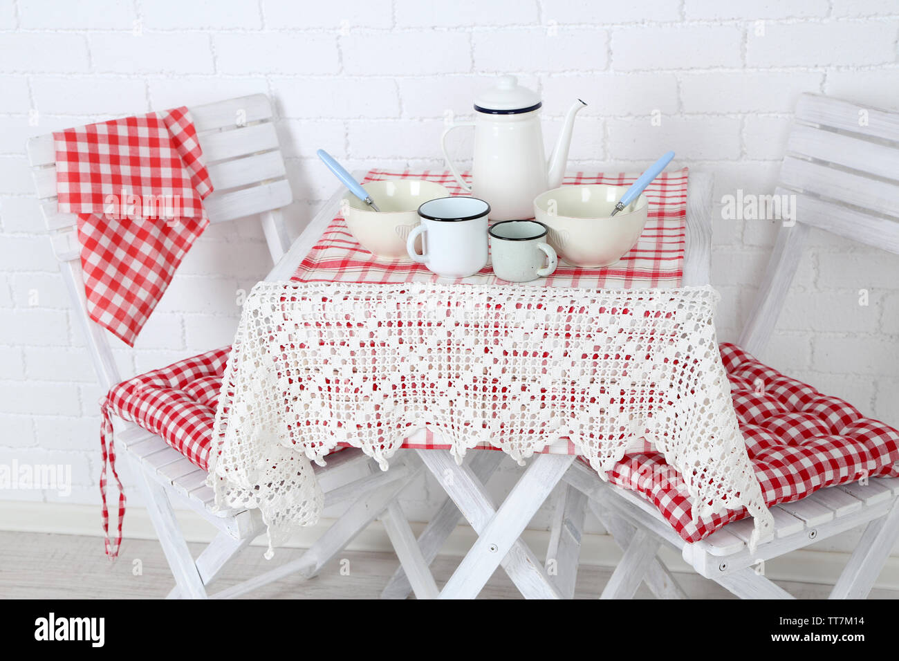 Wooden chairs and table in cozy kitchen Stock Photo - Alamy
