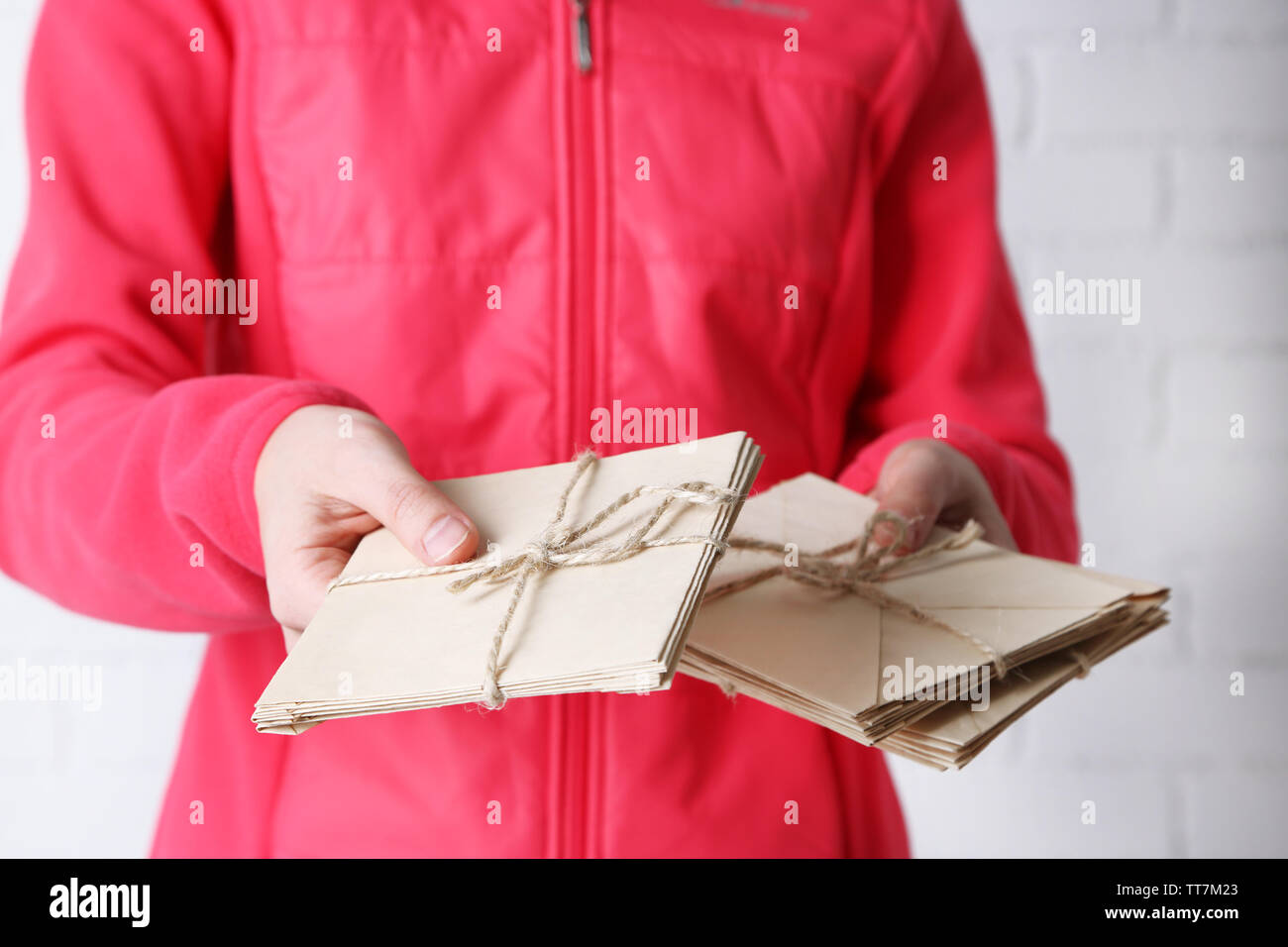 Courier with letters close-up Stock Photo - Alamy