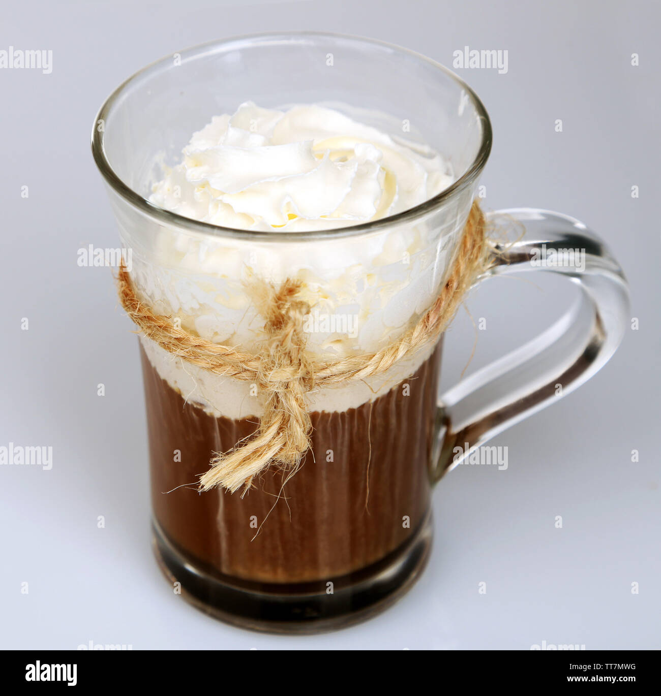 Cup of coffee with cream isolated on white Stock Photo - Alamy