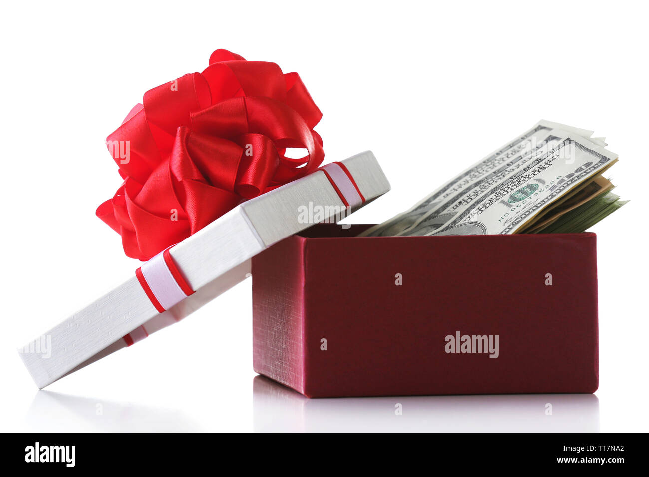 Bundle of dollars in present box with bow isolated on white Stock Photo ...