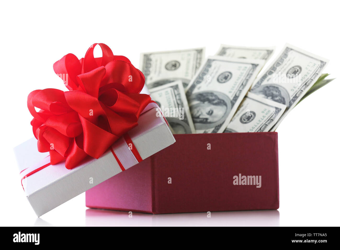 Bundle of dollars in present box with bow isolated on white Stock Photo ...