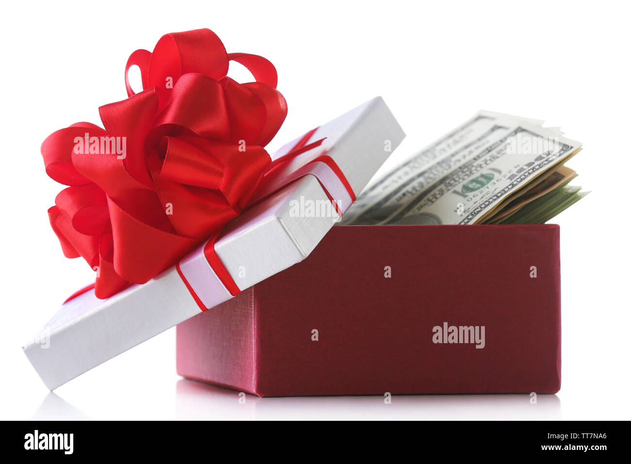 Bundle of dollars in present box with bow isolated on white Stock Photo ...