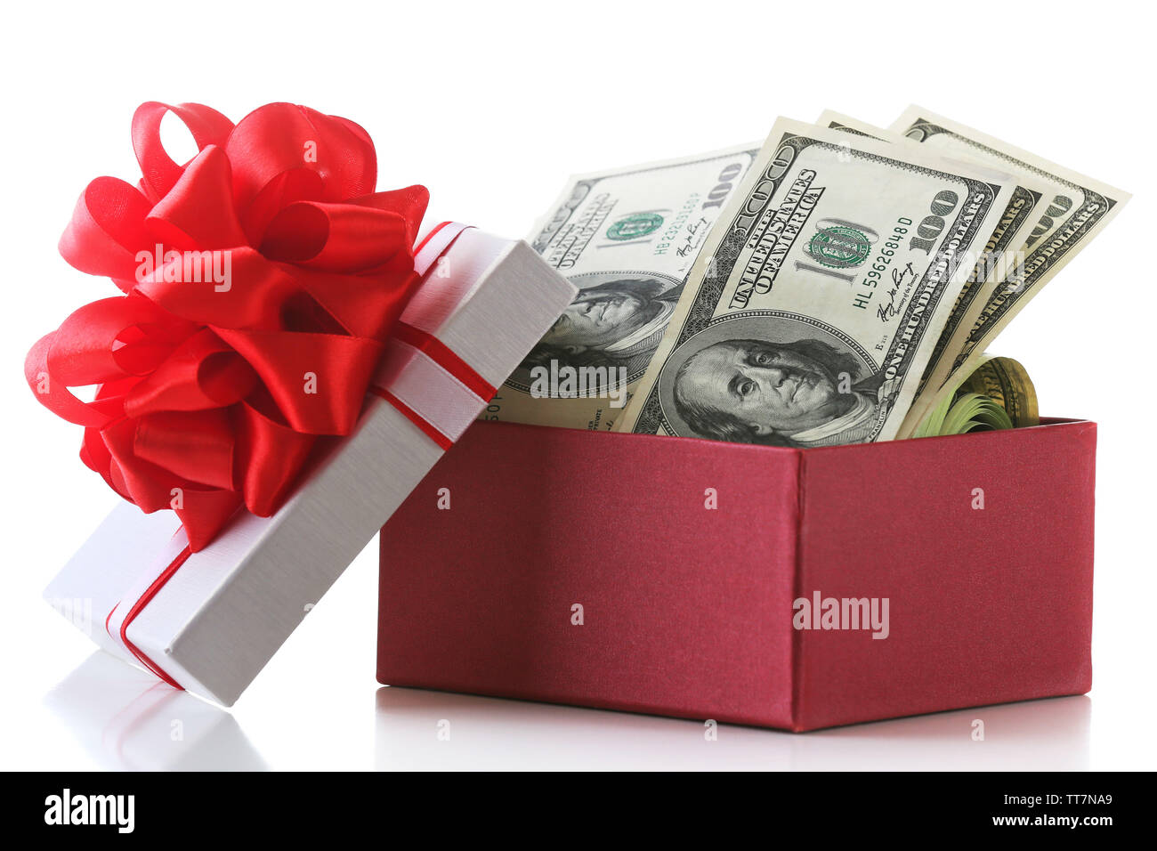 Bundle of dollars in present box with bow isolated on white Stock Photo ...