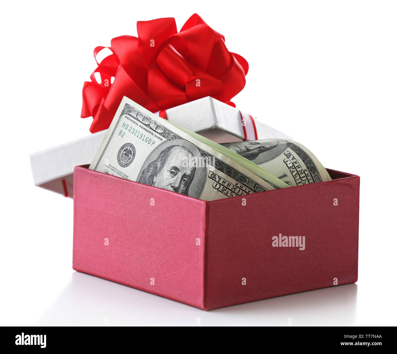 Bundle of dollars in present box with bow isolated on white Stock Photo ...