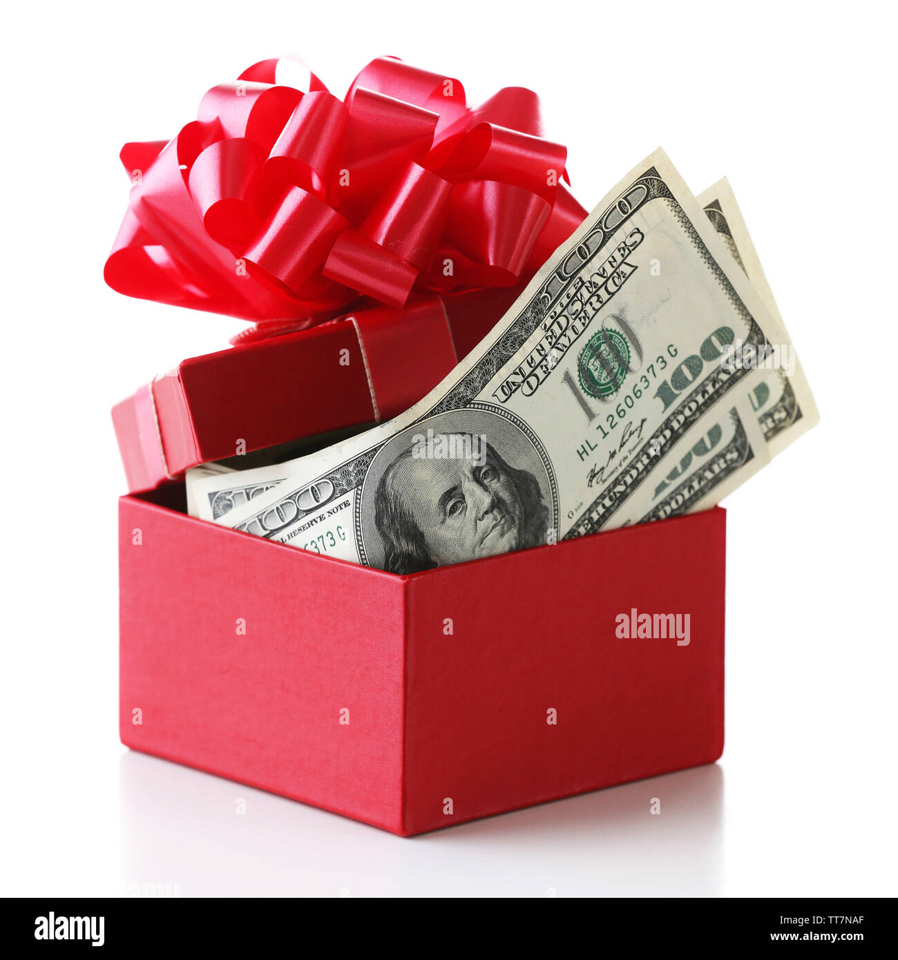 Bundle of dollars in present box with bow isolated on white Stock Photo ...