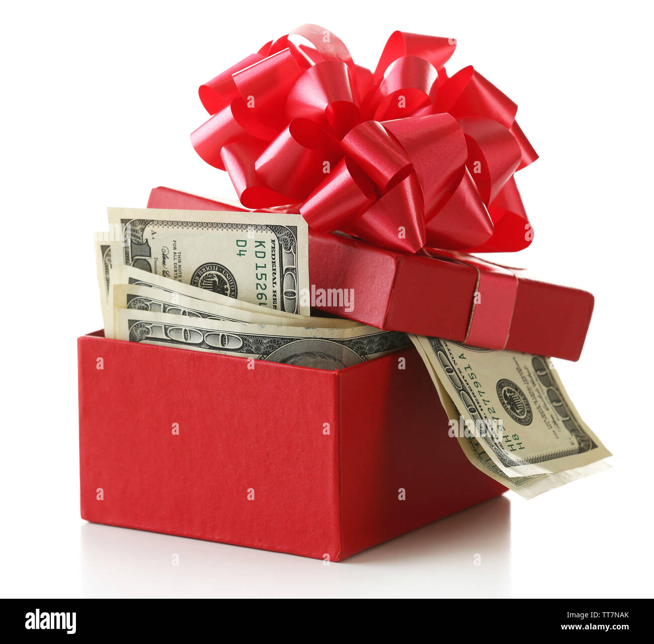 Bundle of dollars in present box with bow isolated on white Stock Photo ...