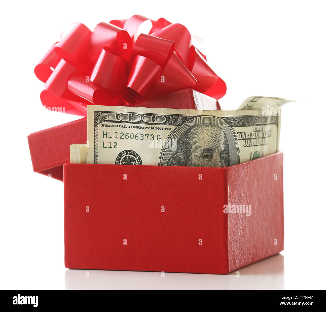 Bundle of dollars in present box with bow isolated on white Stock Photo ...