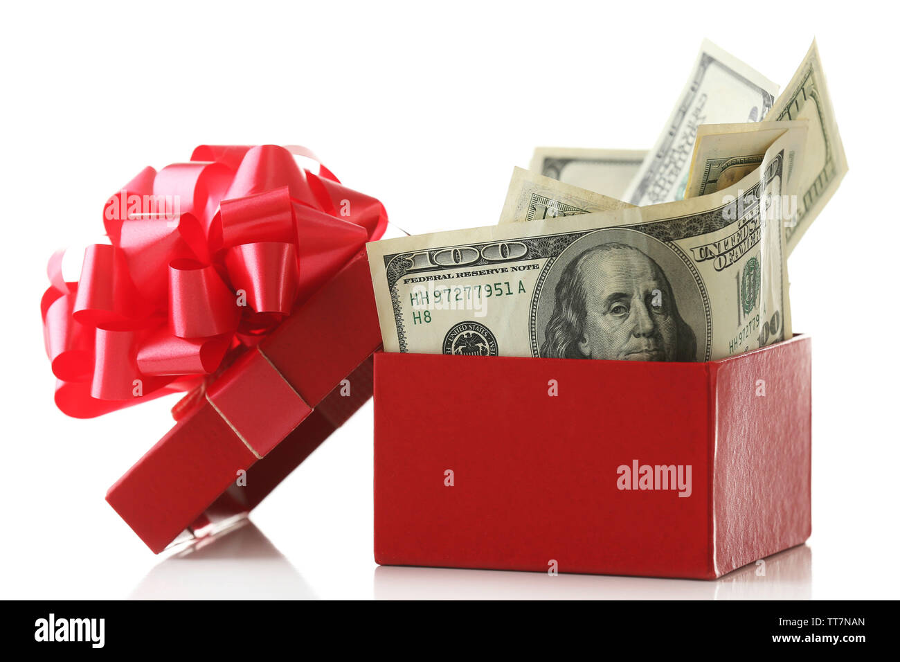 Bundle of dollars in present box with bow isolated on white Stock Photo ...
