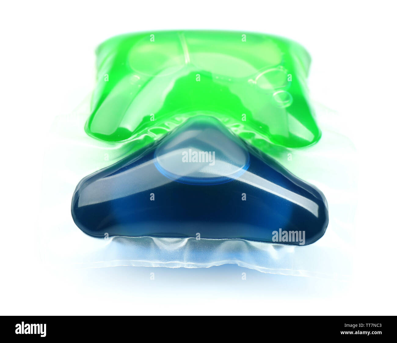 Gel capsule with laundry detergent isolated on white Stock Photo - Alamy