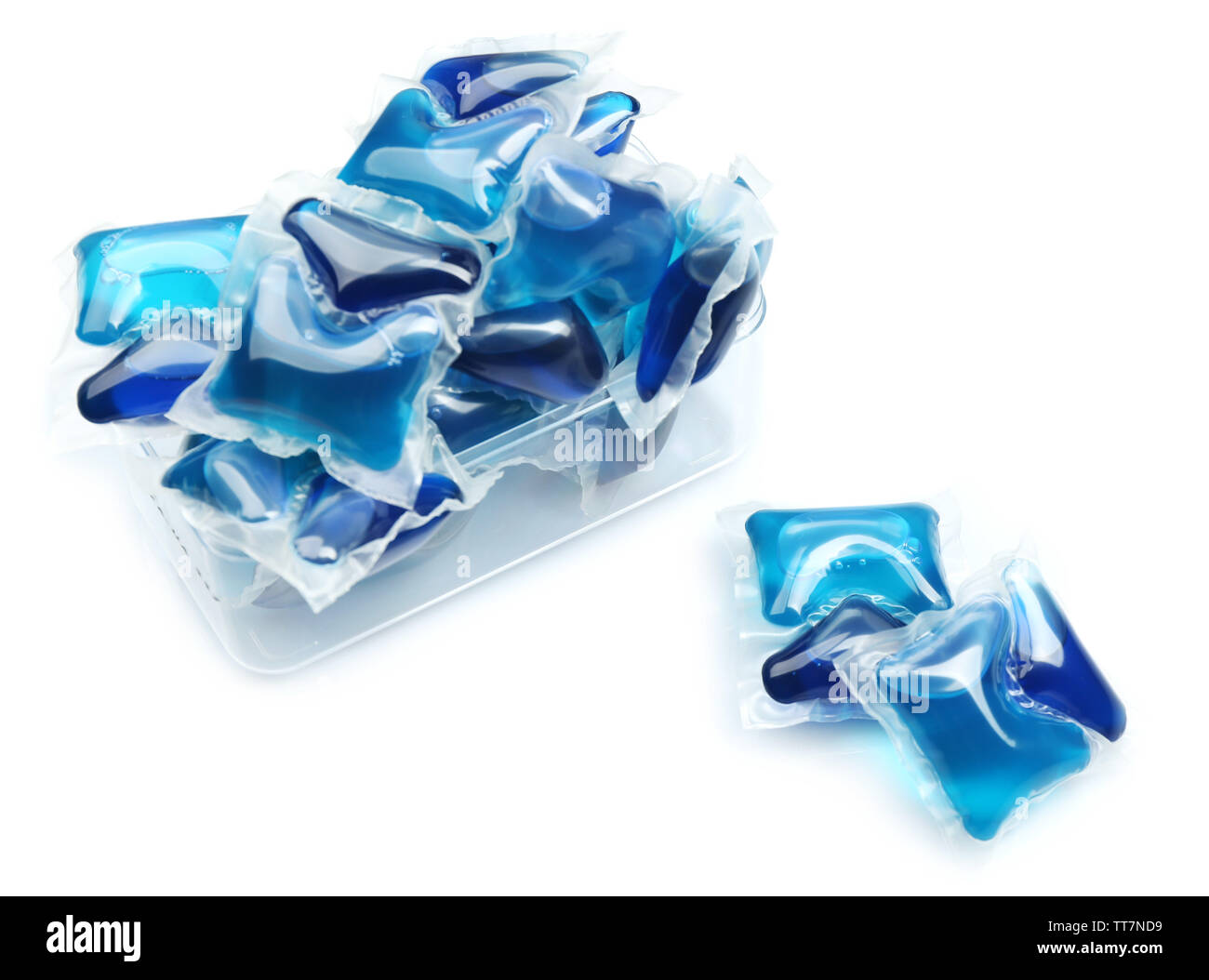 Gel capsules with laundry detergent isolated on white Stock Photo - Alamy