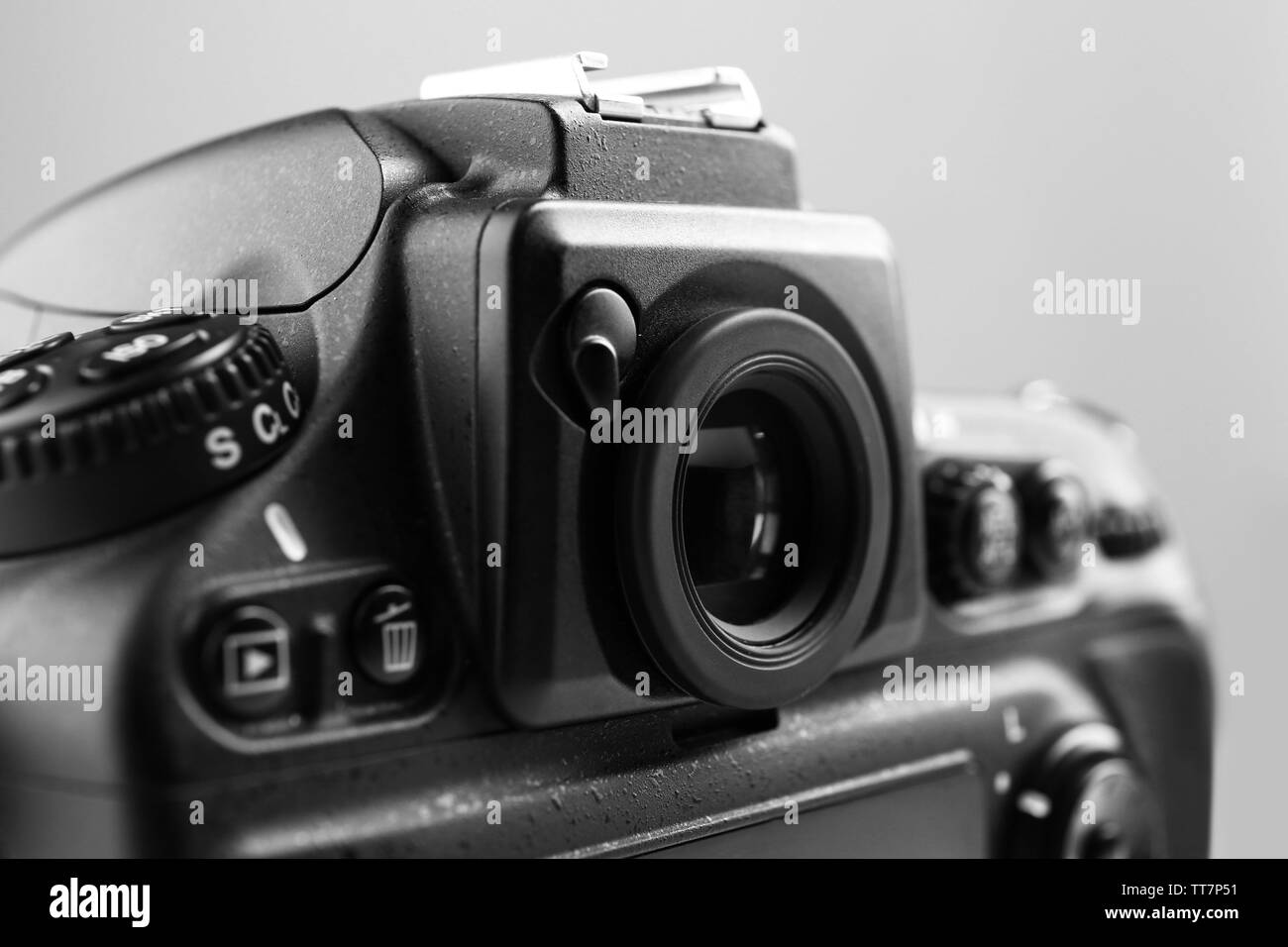 Digital camera on gray background Stock Photo - Alamy