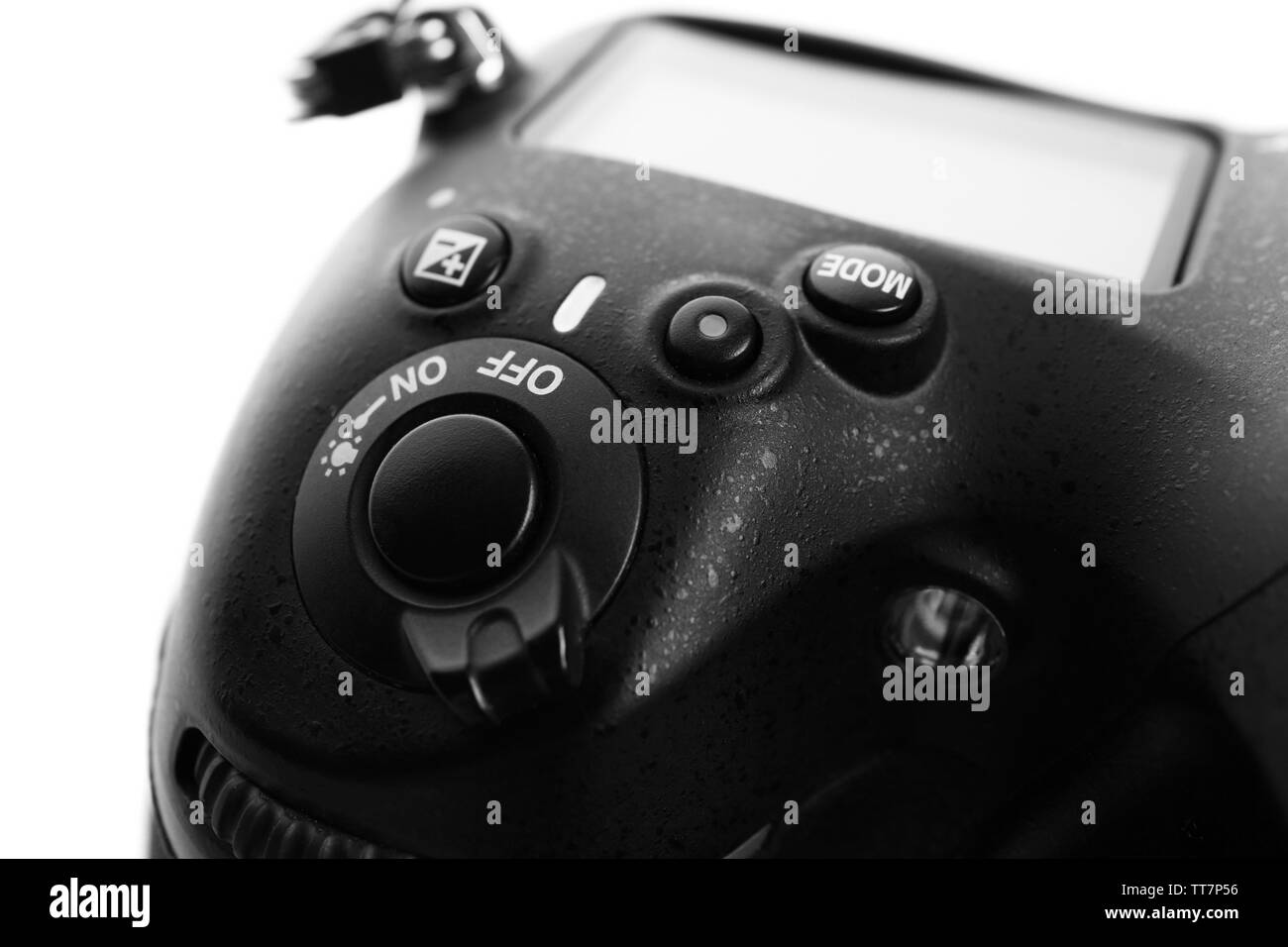 Digital camera on light background Stock Photo - Alamy