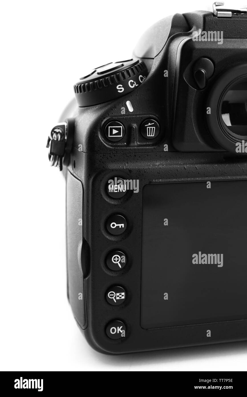 Digital camera on light background Stock Photo - Alamy