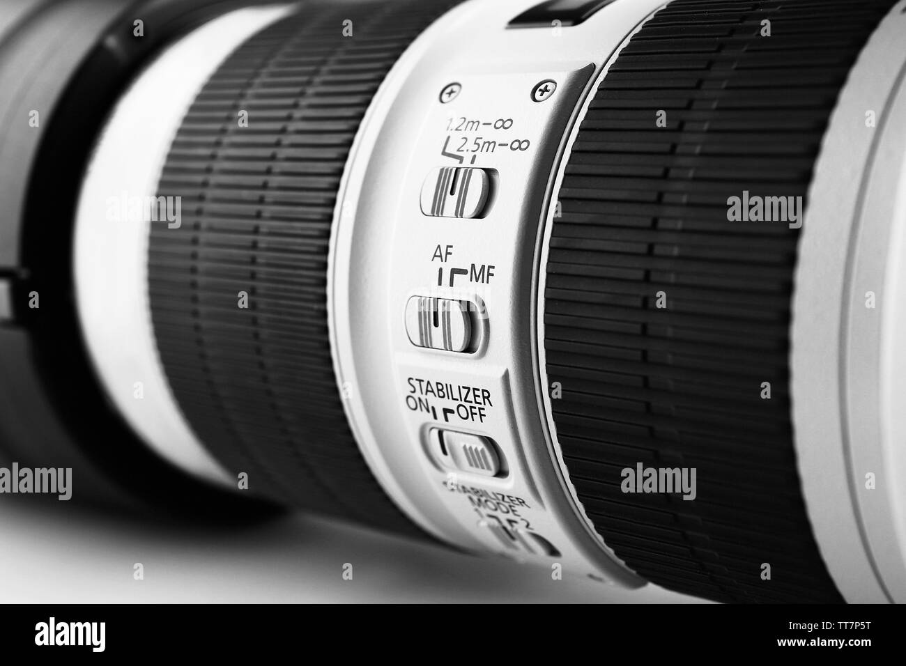 Camera lens on light background Stock Photo - Alamy