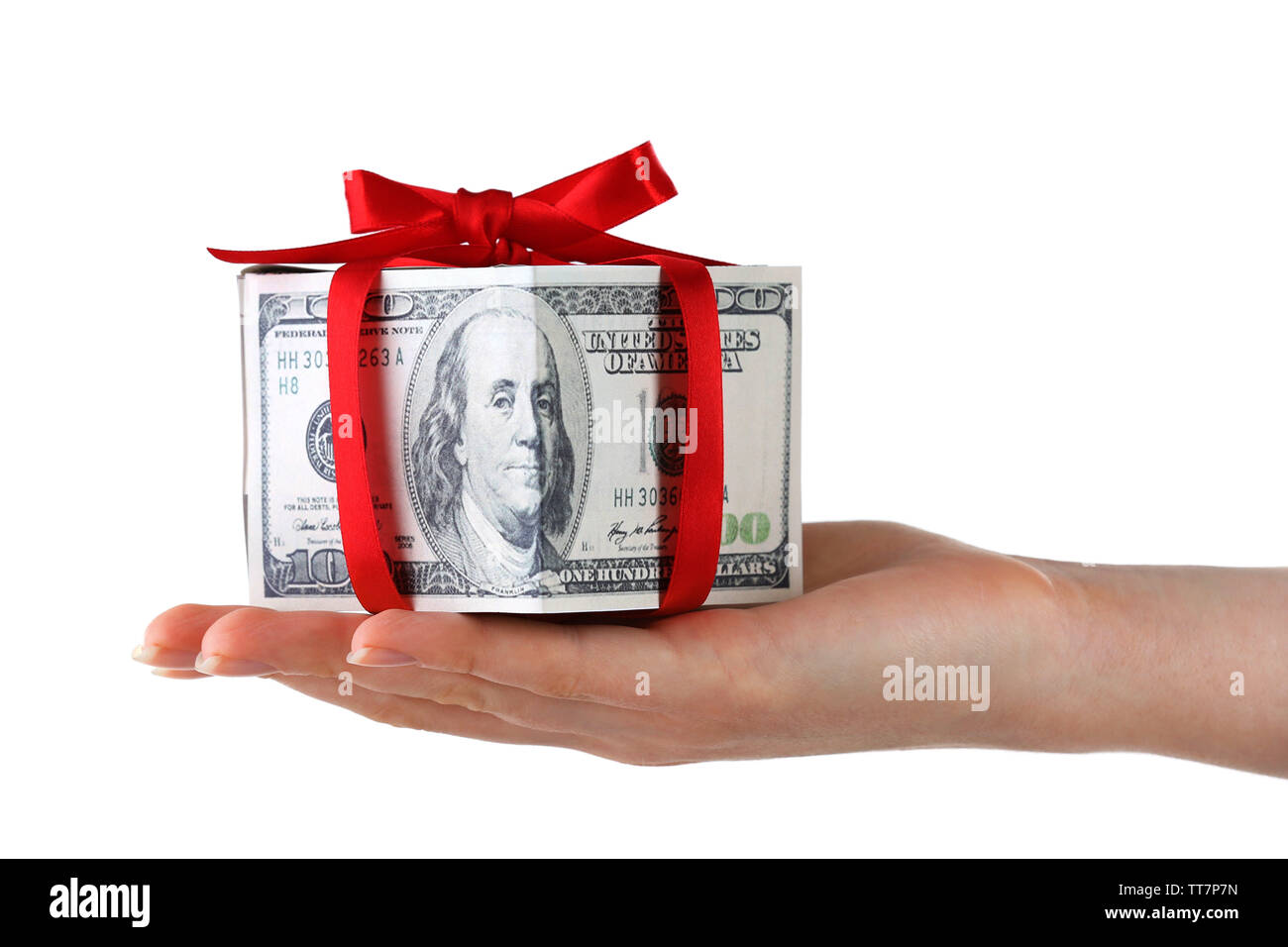 Hand holding money present box isolated on white Stock Photo - Alamy