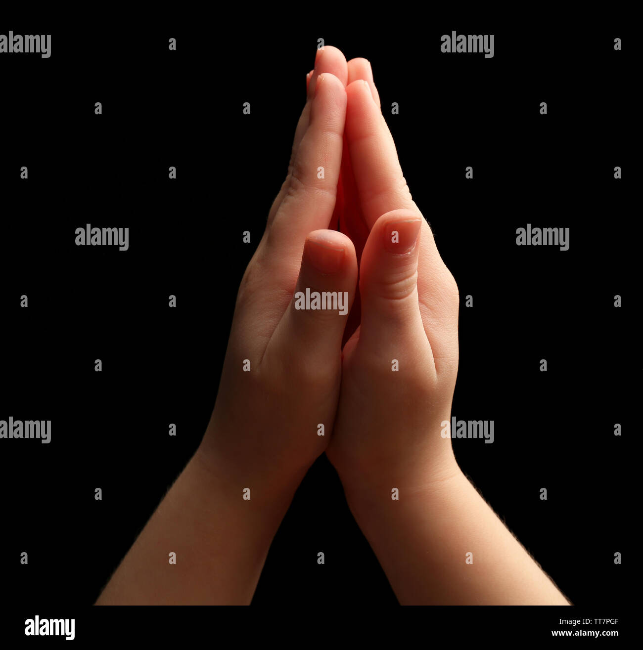 Child hands on black background Stock Photo - Alamy