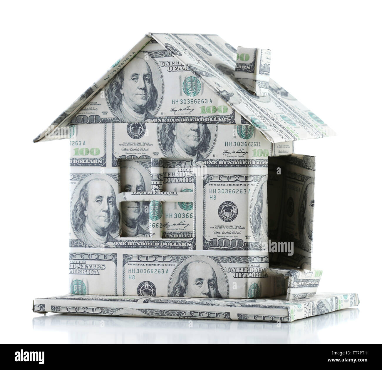 Money house isolated on white Stock Photo - Alamy