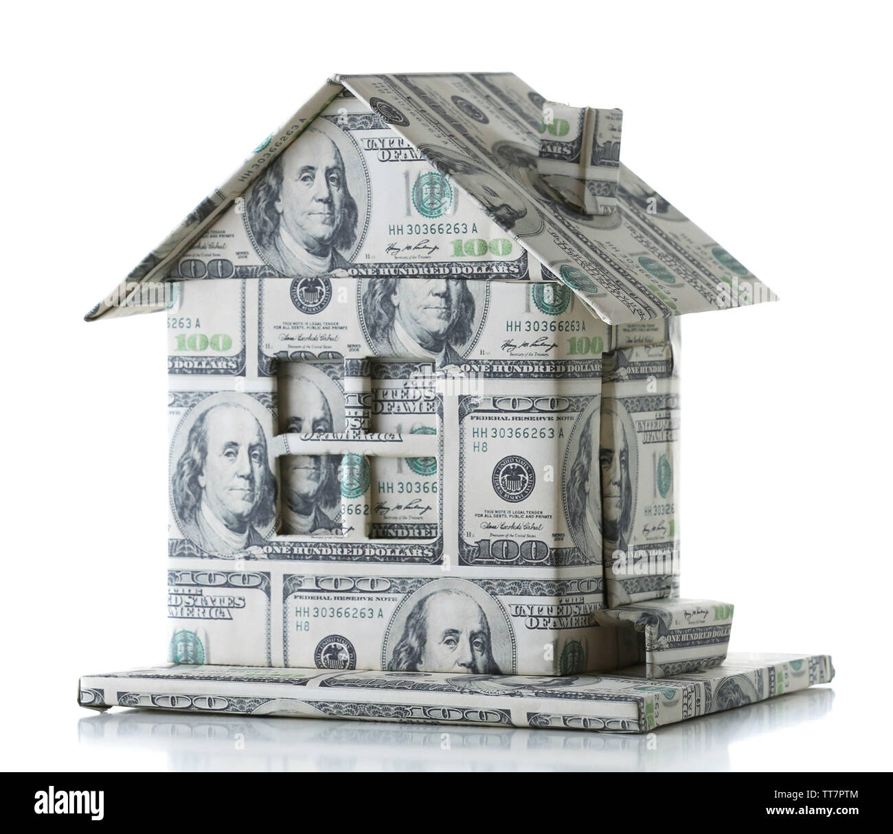 Money house isolated on white Stock Photo - Alamy