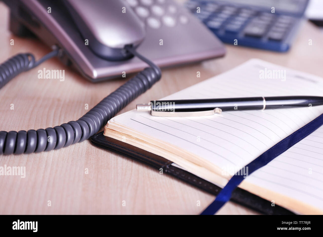 Office workplace with phone set close up Stock Photo - Alamy
