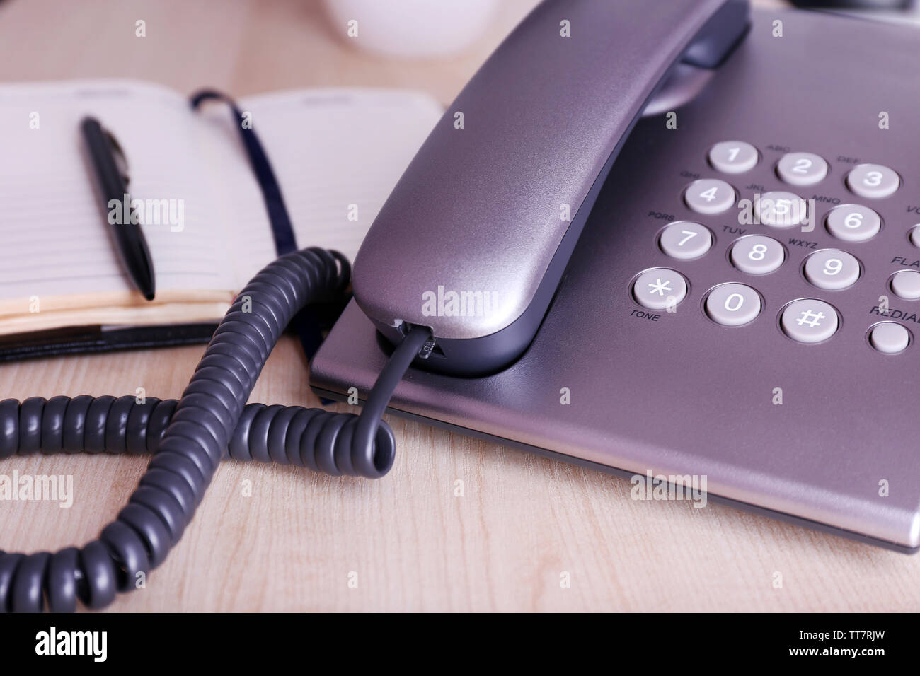 Office workplace with phone set close up Stock Photo - Alamy