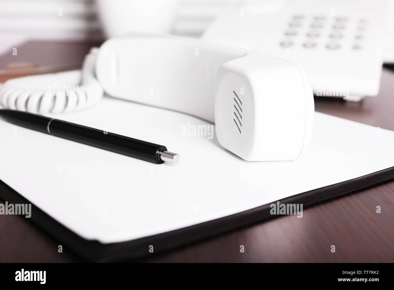 Office workplace with phone set close up Stock Photo - Alamy