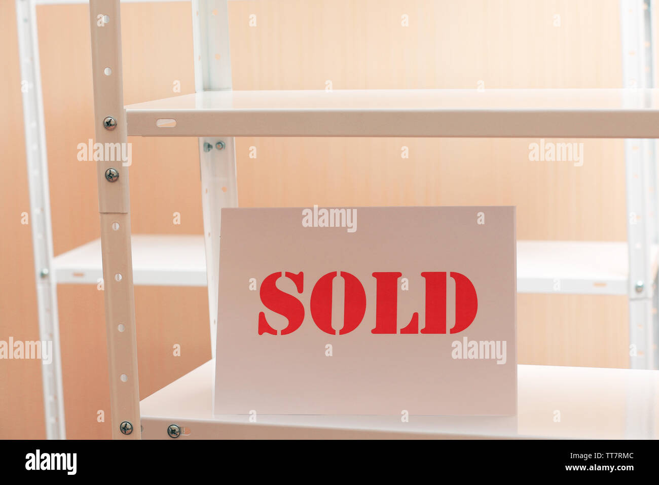 Blank with text sold on light background Stock Photo - Alamy