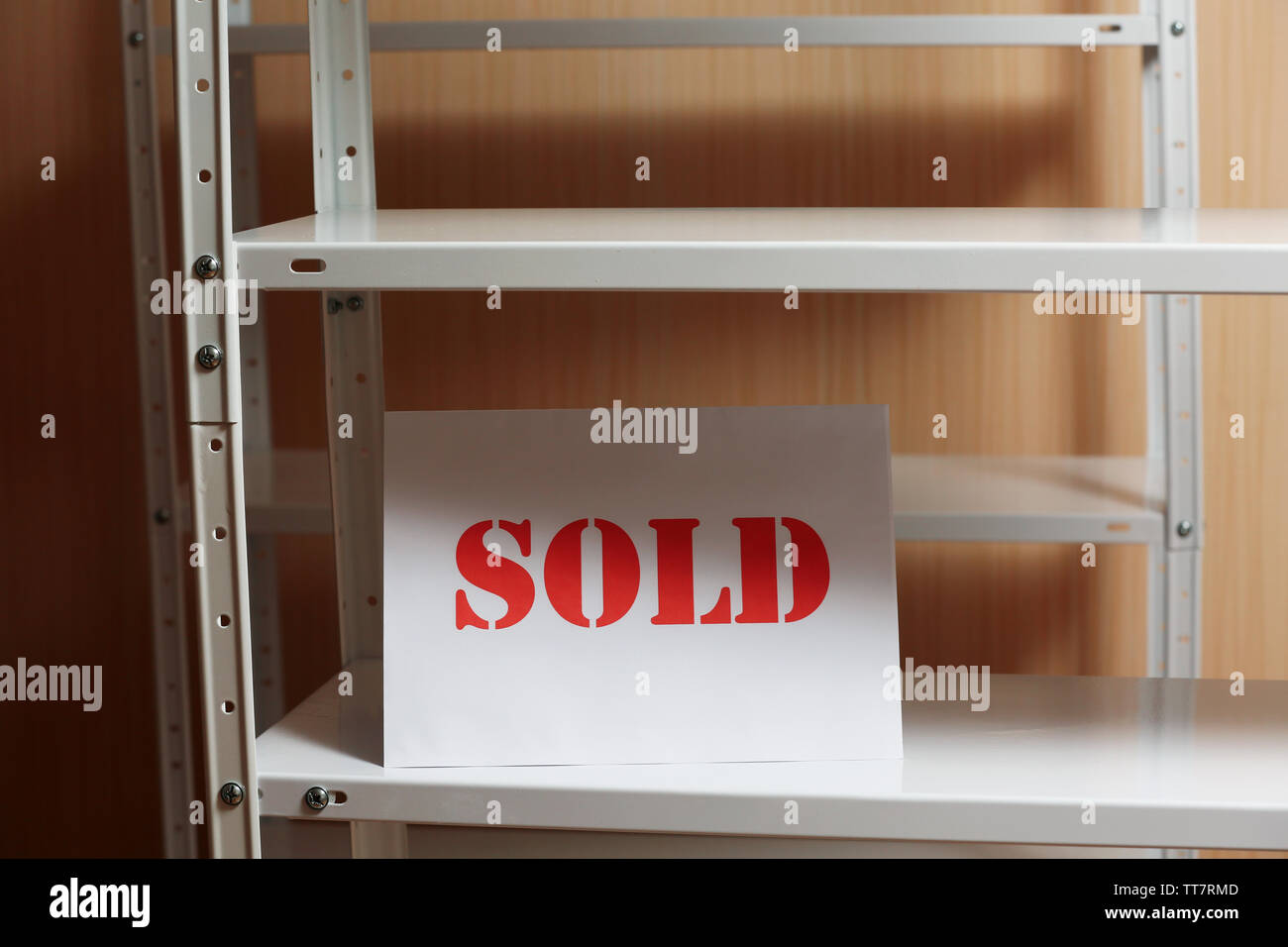 Blank with text sold on light background Stock Photo - Alamy