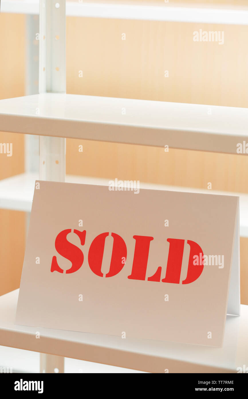 Blank with text sold on light background Stock Photo - Alamy