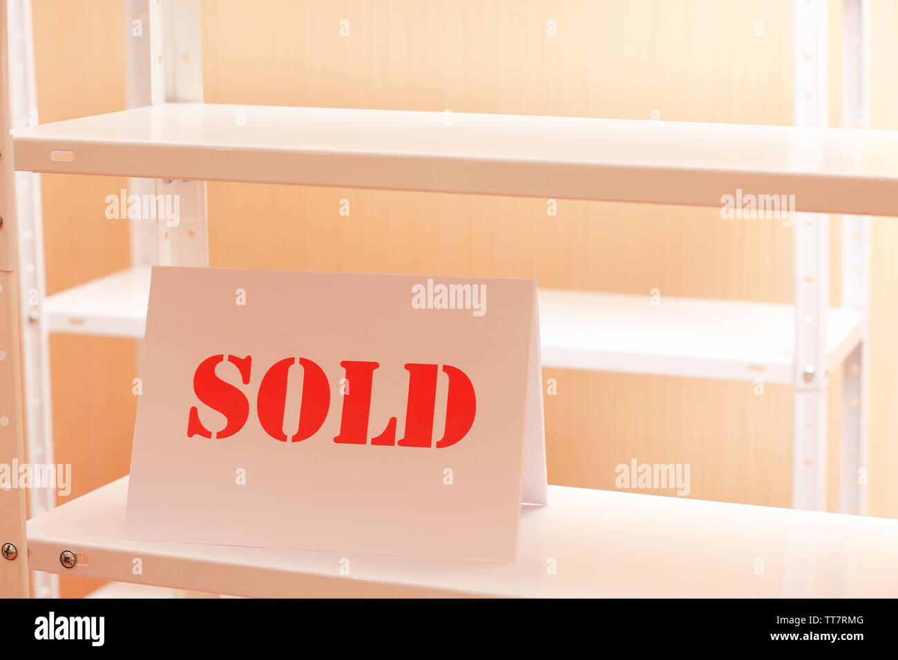 Blank with text sold on light background Stock Photo - Alamy