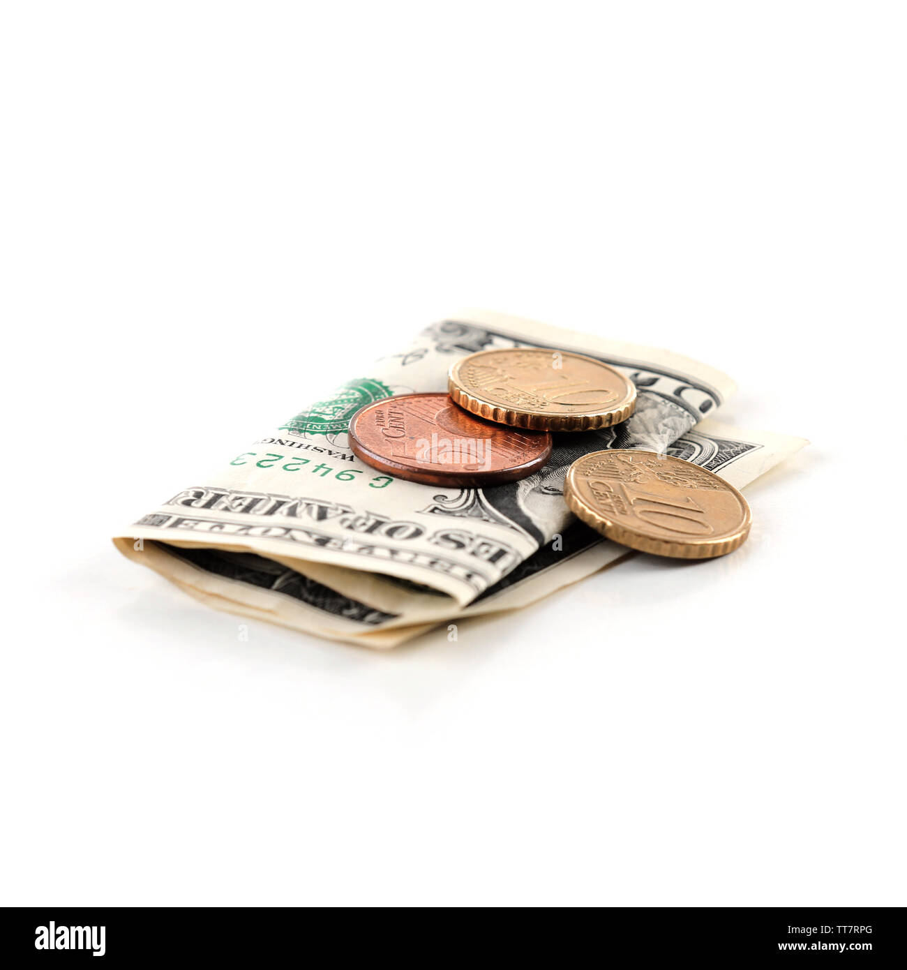 Paper money and coins isolated on white Stock Photo - Alamy
