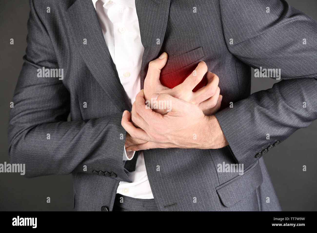 Man having chest pain - heart attack close up Stock Photo - Alamy