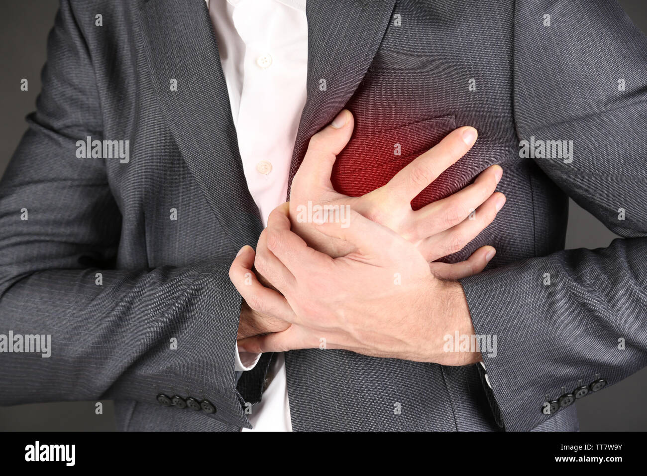 Man having chest pain - heart attack close up Stock Photo - Alamy