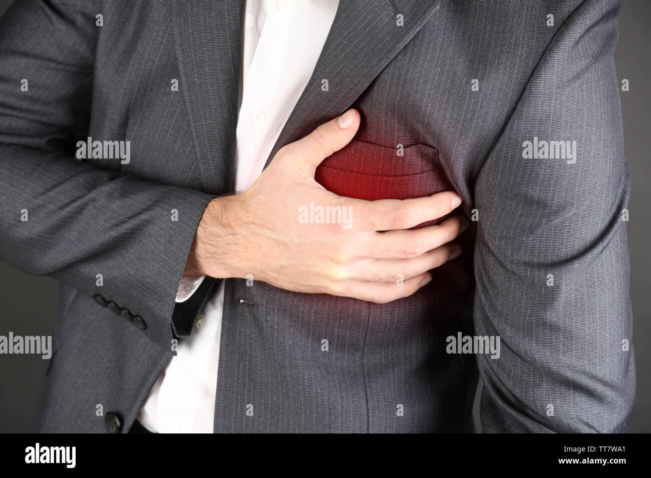 Man having chest pain - heart attack close up Stock Photo - Alamy