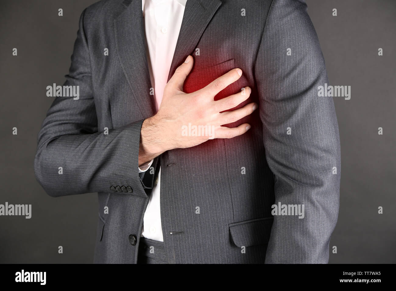 Man having chest pain - heart attack close up Stock Photo - Alamy