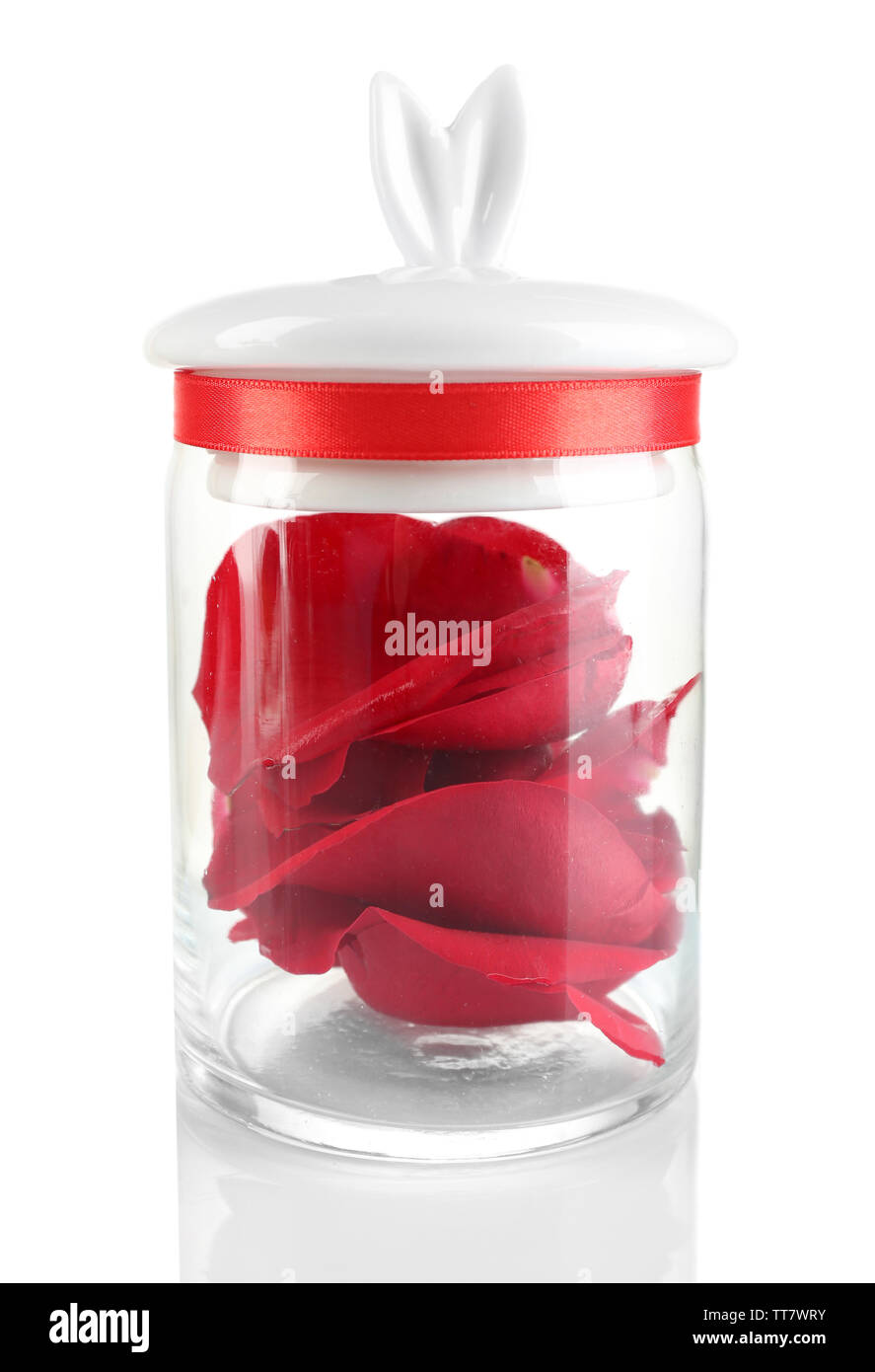 Rose petals in glass jar isolated on white Stock Photo - Alamy