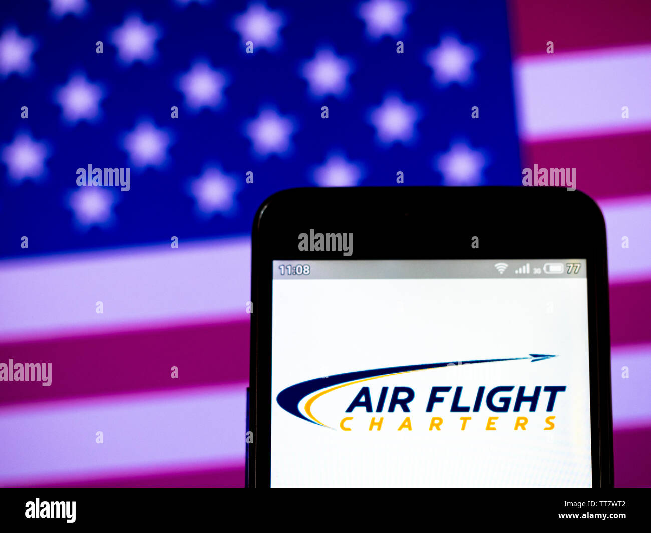 In this photo illustration the Air Flight Charters logo is seen ...