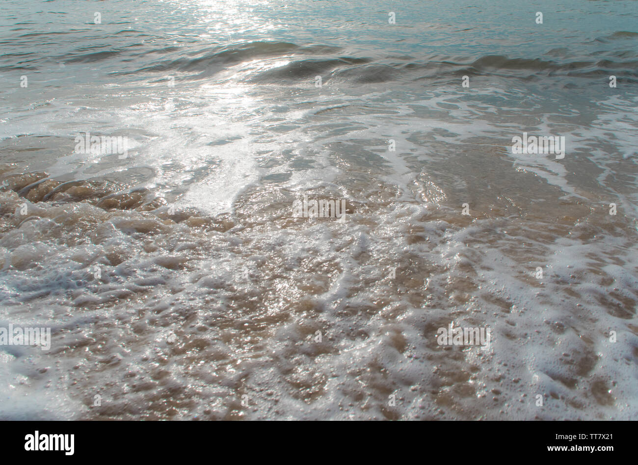 Bubble of Sea wave on the beach Stock Photo - Alamy