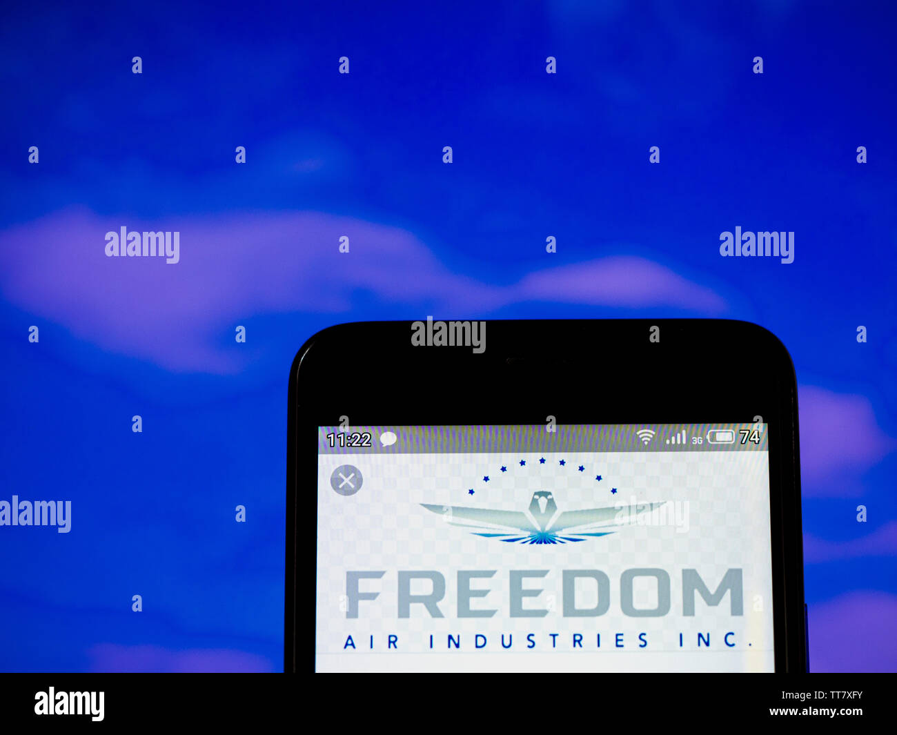 In this photo illustration the Freedom Air Industries Inc logo is seen ...