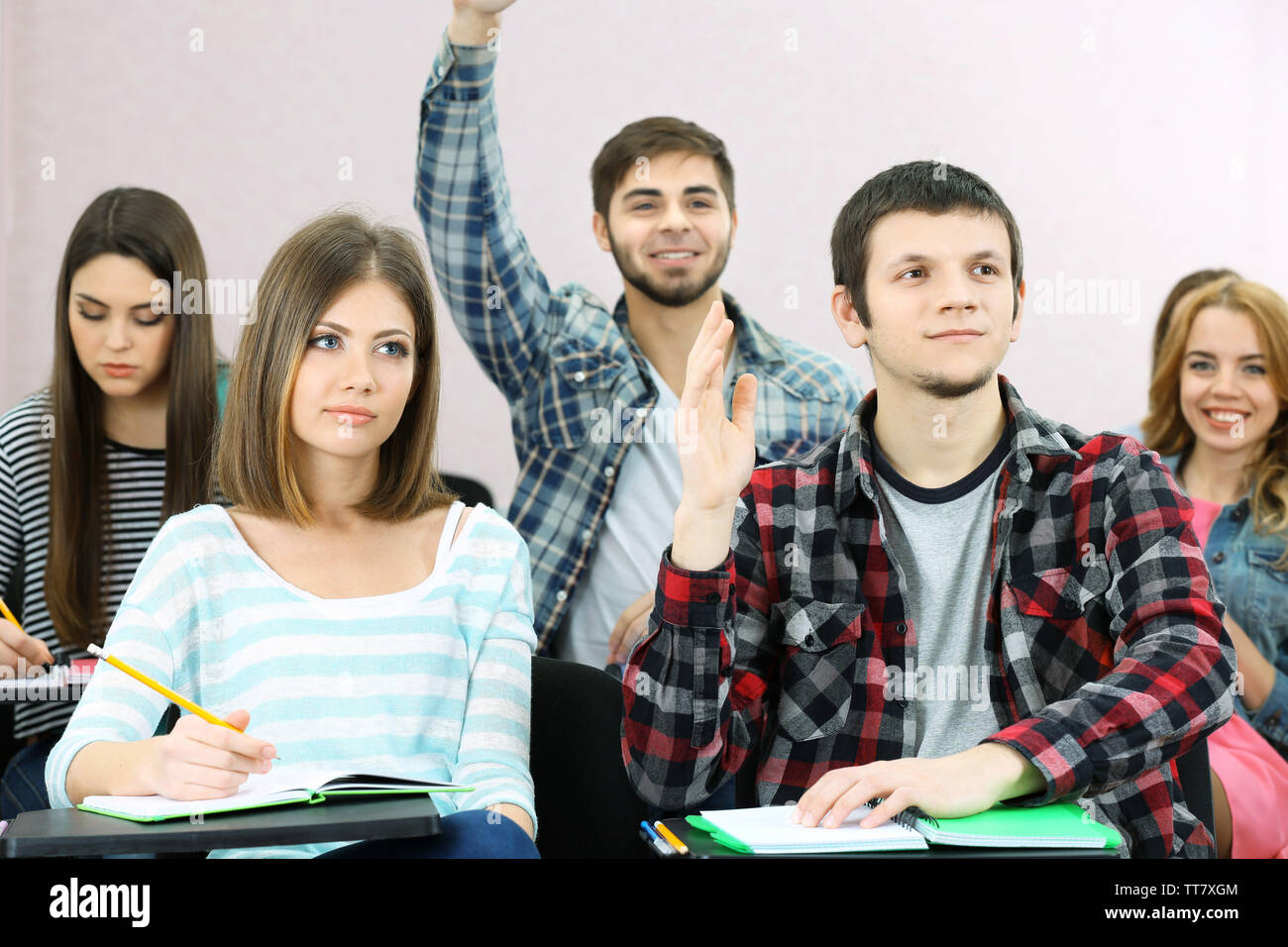 Group of students sitting in classroom Stock Photo - Alamy
