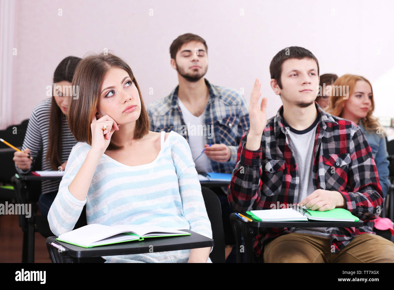 Group of students sitting in classroom Stock Photo - Alamy