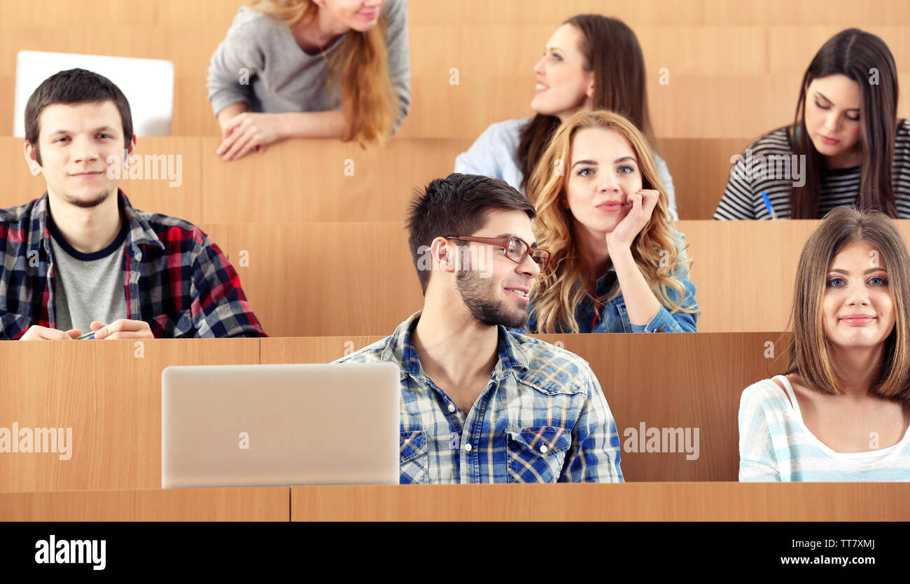 Group of students sitting in classroom Stock Photo - Alamy