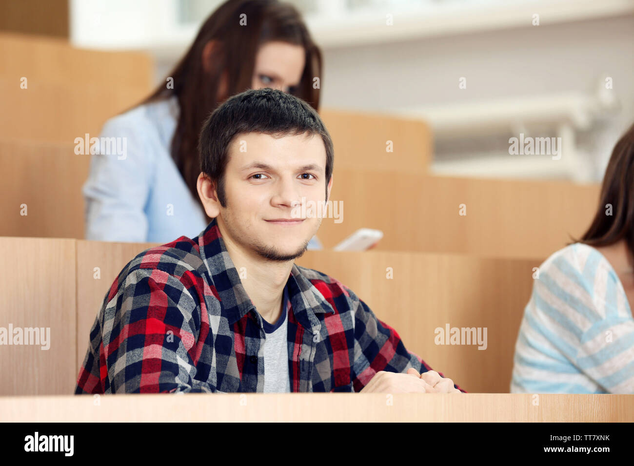 Group of students sitting in classroom Stock Photo - Alamy