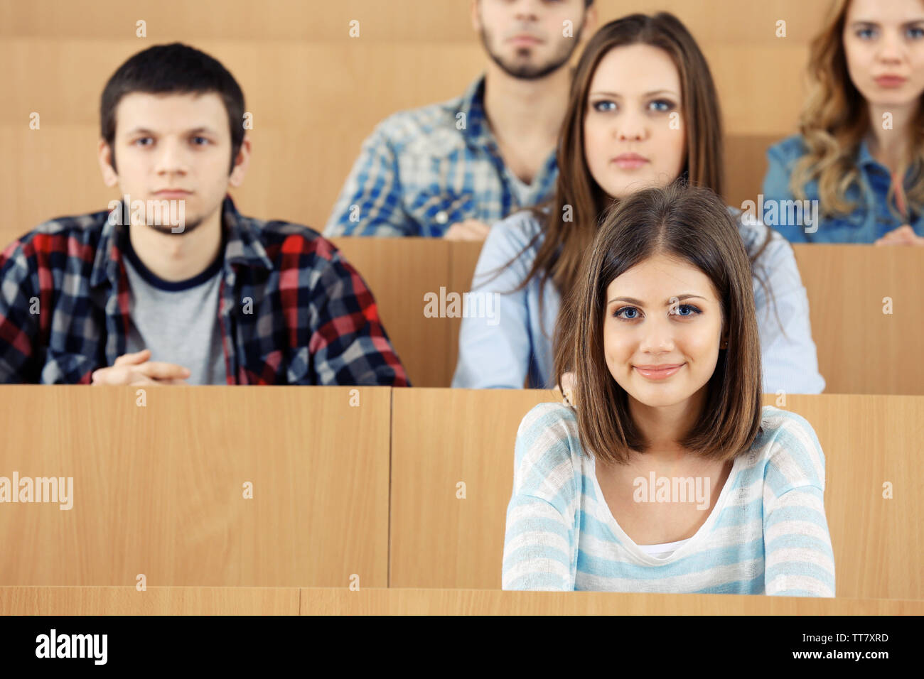 Group of students sitting in classroom Stock Photo - Alamy