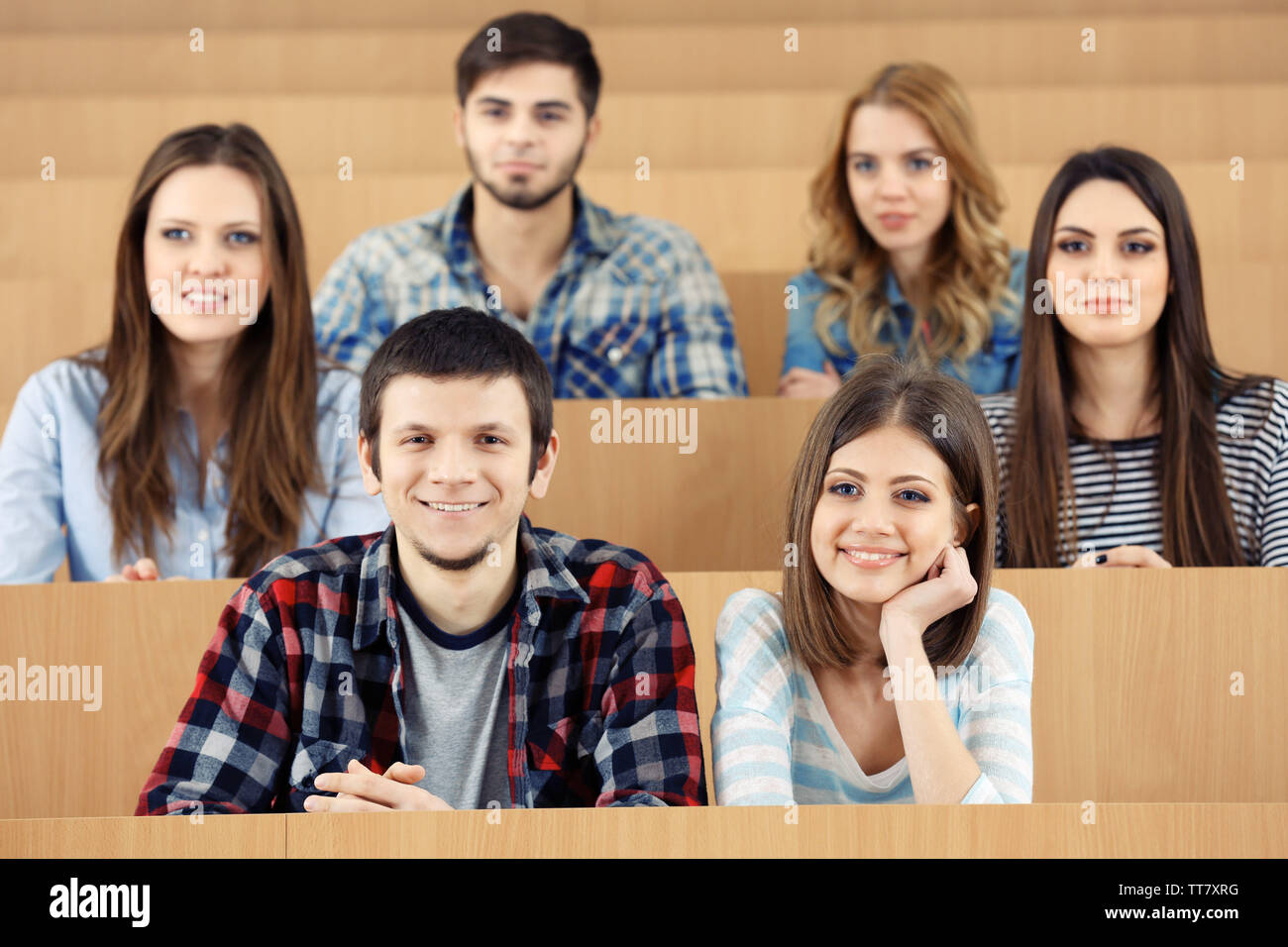 Group of students sitting in classroom Stock Photo - Alamy